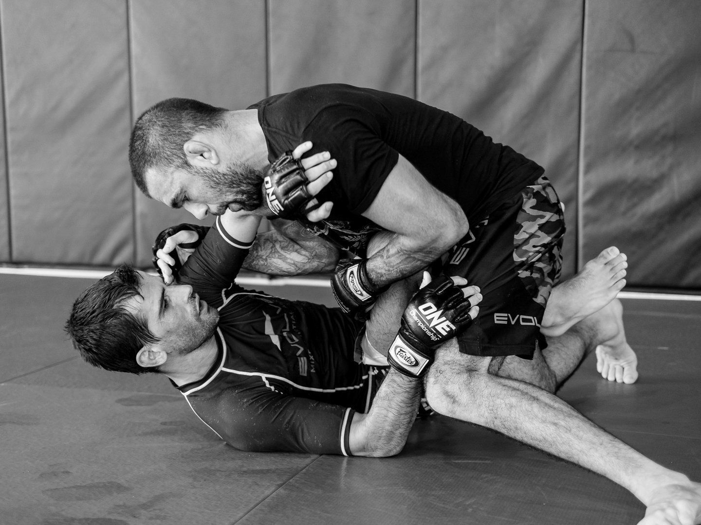 How To Combat A Half Guard Player In BJJ (Videos) - Evolve Vacation